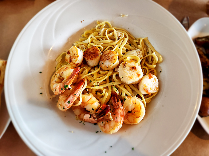 Pasta that's taken a delightful detour to the ocean. When carbs and seafood have this kind of chemistry, you don't question it.