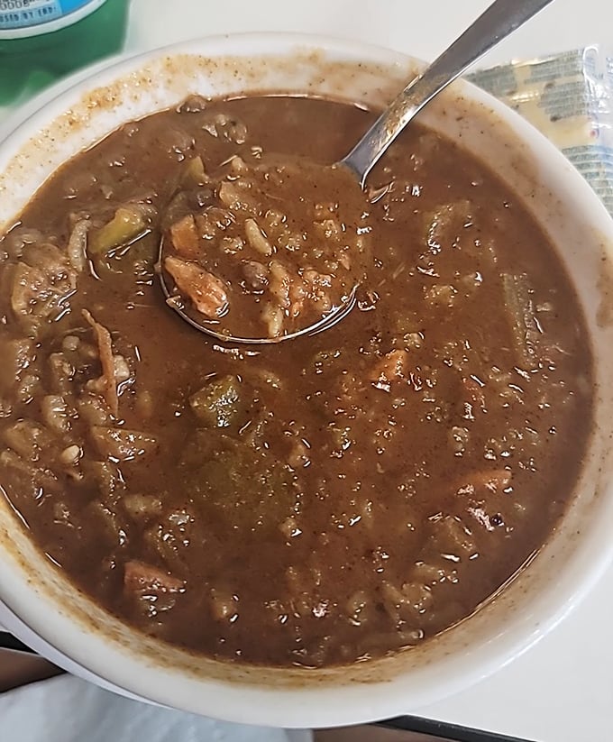 A bowl of gumbo so rich and complex it could teach a master class in depth of flavor. Spoon required, bib recommended.