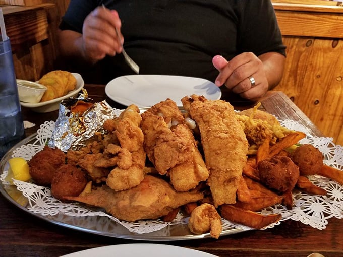 The seafood platter that makes sharing impossible. One look and you'll be plotting how to distract your dining companions while you grab the extra hush puppy.