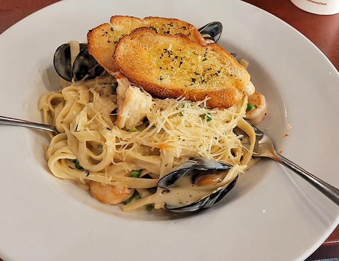 Seafood pasta that makes you question why you ever ordered it anywhere else. Those mussels didn't die in vain.
