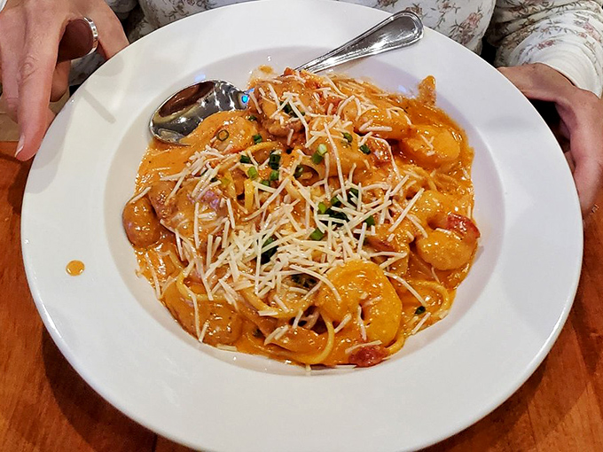 Seafood pasta that would make an Italian grandmother nod in approval. Those shrimp aren't hiding in the sauce—they're proudly announcing their freshness.