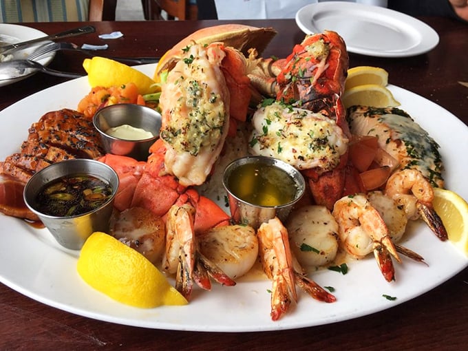 The seafood platter that makes you wonder if you should have brought more friends or a bigger appetite. Those butter dipping sauces are liquid gold.