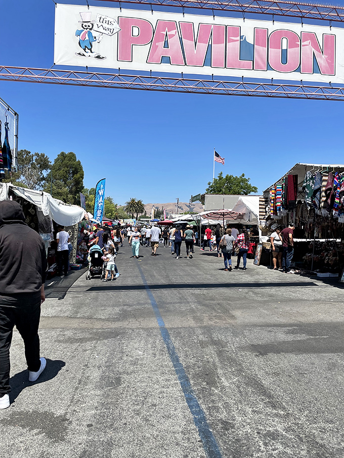The Pavilion entrance beckons shoppers into its realm of retail therapy. Blue skies above, bargains below&mdash;a perfect California shopping equation.