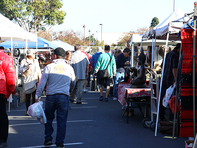 Weekend warriors navigate treasure trails with the focused intensity of seasoned archaeological expeditions gone shopping.