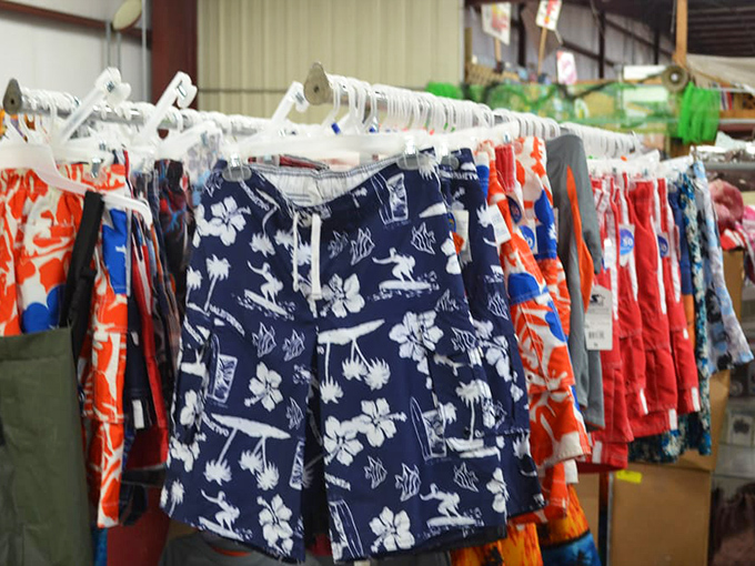 Hawaiian patterns and vacation vibes hang in perfect rows. Nothing says "I'm ready for summer" quite like shorts that could be spotted from space.