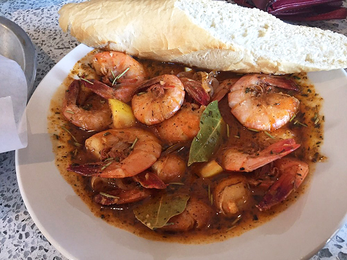 These shrimp swimming in savory broth with bay leaves are like the seafood equivalent of a warm hug&mdash;comforting, familiar, and impossible to refuse.