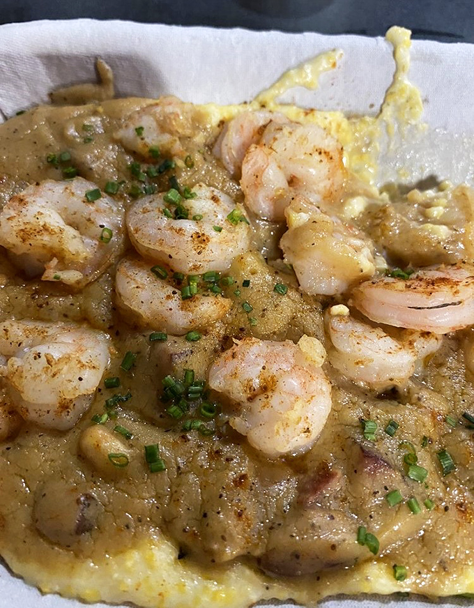 Shrimp and grits &ndash; where butter meets soul. This isn't just breakfast elevated; it's the South's comfort food philosophy on a plate.