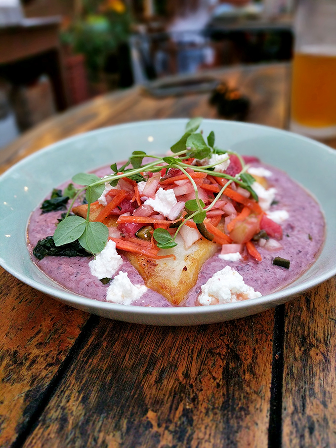 Shrimp and grits so perfect, they could broker peace treaties between North and South Carolina.