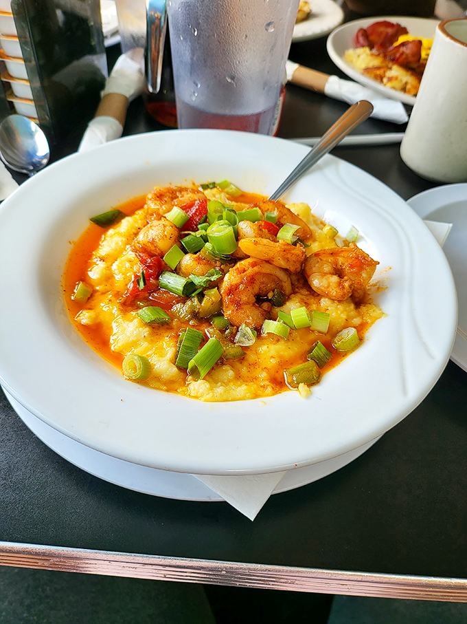Shrimp and grits that would make a Southerner weep with joy, topped with green onions for that "I'm being healthy" illusion.