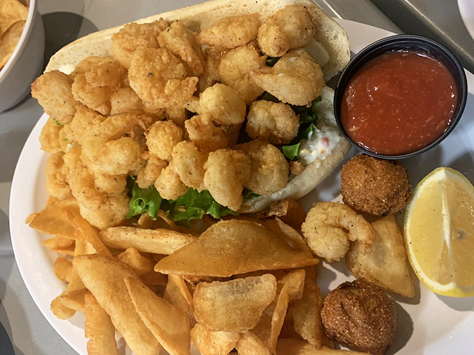The Shrimp Po' Boy &ndash; where crispy crustaceans meet fresh veggies in a handheld masterpiece that would make New Orleans proud but with a distinctly Florida accent.