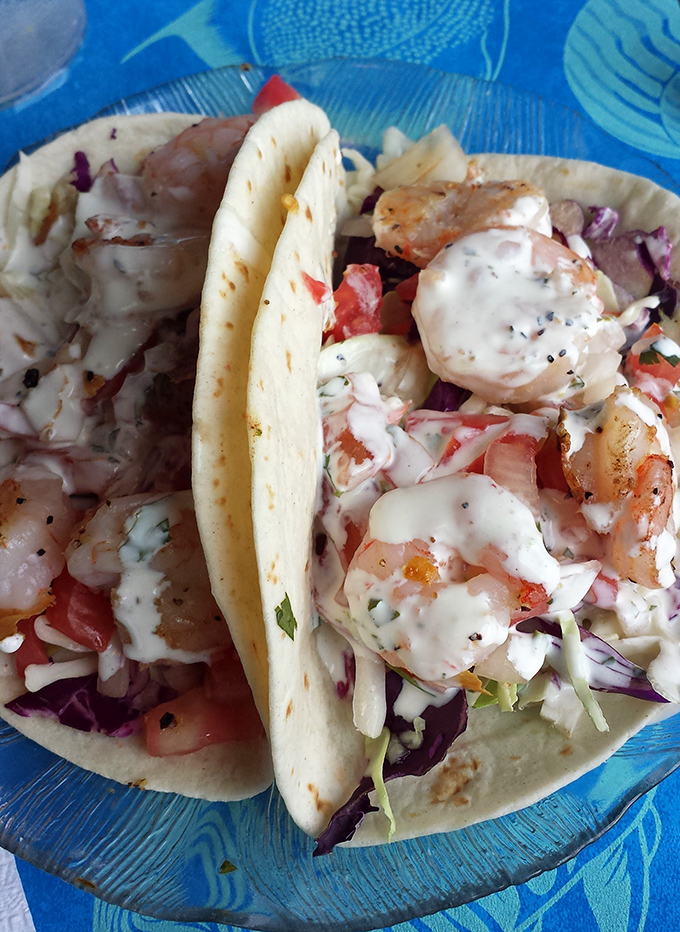 Shrimp tacos that bring a taste of coastal vacation to your everyday life. The perfect handheld delivery system for seafood bliss.