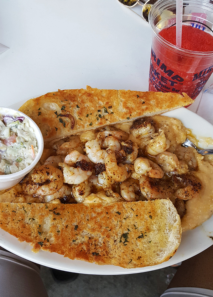 Shrimp and grits done right &ndash; creamy, dreamy, and worth every single calorie on that plate.