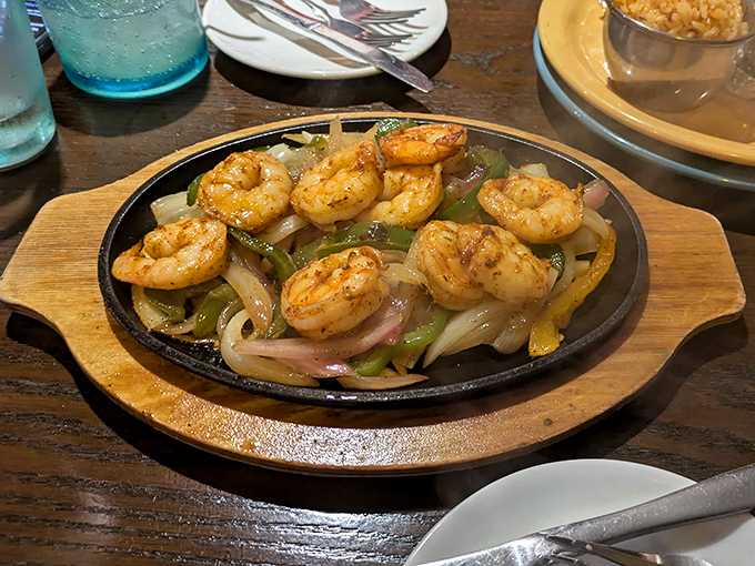 Sizzling shrimp fajitas that announce their arrival with both sound and aroma, making every head in the restaurant turn with envy.