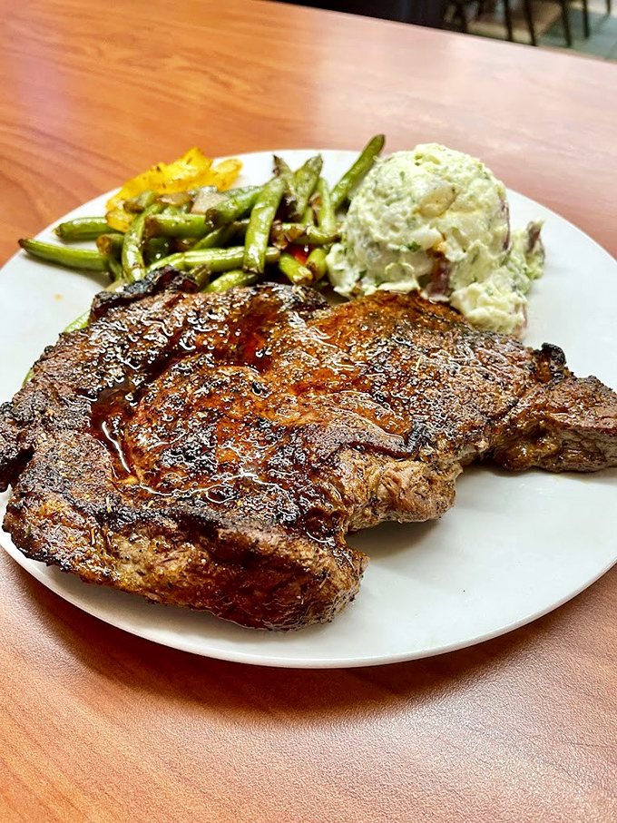 Steakhouses charging triple couldn't improve on this perfectly seared sirloin. The potato salad and green beans aren't sidekicks&mdash;they're essential supporting characters in this meaty drama.