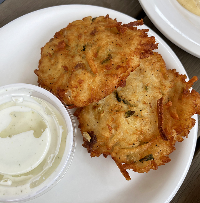 Golden smashed potatoes that prove sometimes the best things come beautifully broken and seasoned to perfection.