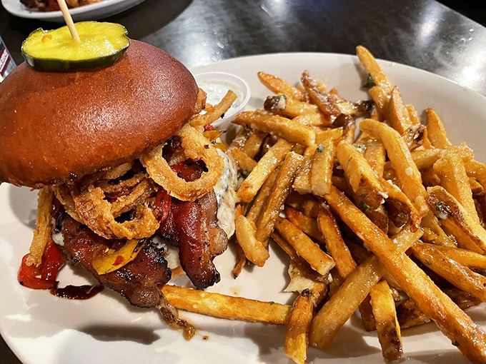 Behold the burger that launched a thousand road trips. Those golden fries aren't just sides&mdash;they're supporting actors deserving their own Oscar.