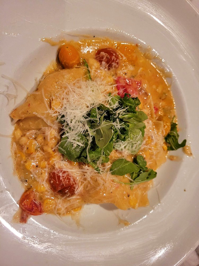 Smoked chicken ravioli swimming in golden perfection - comfort food elevated to fine art status here.