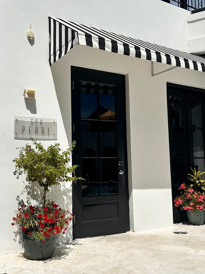 The Pearl Spa's crisp black-and-white awning promises the kind of pampering that turns "I need a vacation from my vacation" into "I'm never leaving."