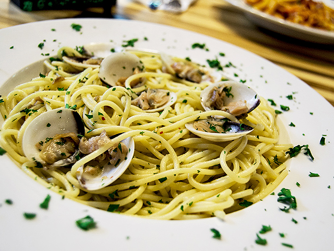The ocean called and sent its best regards. Fresh clams nestled in pasta, bathing in a garlicky white wine sauce that sings of seaside villages.