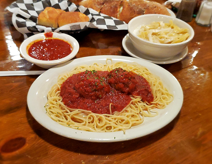 Classic spaghetti and meatballs served with a side of nostalgia. This isn't just pasta&mdash;it's a warm hug from an Italian grandmother you never knew you had.