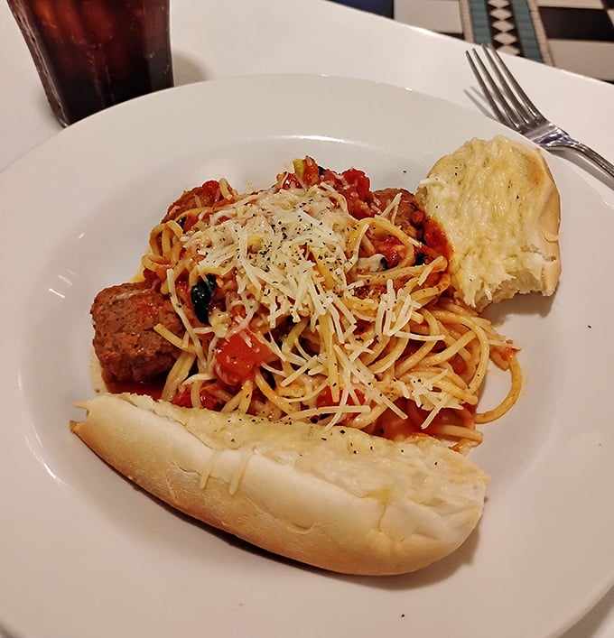 Spaghetti and meatballs so generous, even your Italian grandmother would nod with grudging approval here.
