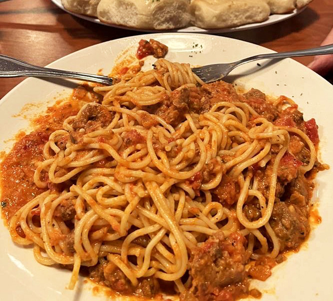 Pasta perfection that doesn't hide behind fancy plating&mdash;just honest-to-goodness meat sauce clinging to every strand like it's afraid you'll separate them.