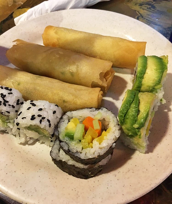 Spring rolls and sushi share space with perfect harmony &ndash; proof that on a good buffet plate, traditional boundaries deliciously dissolve.