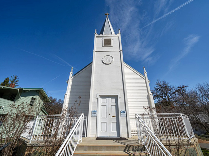 St. Joseph's Catholic Church stands pristine against the blue Sierra sky, a spiritual landmark that's been comforting souls since long before meditation apps were invented. 