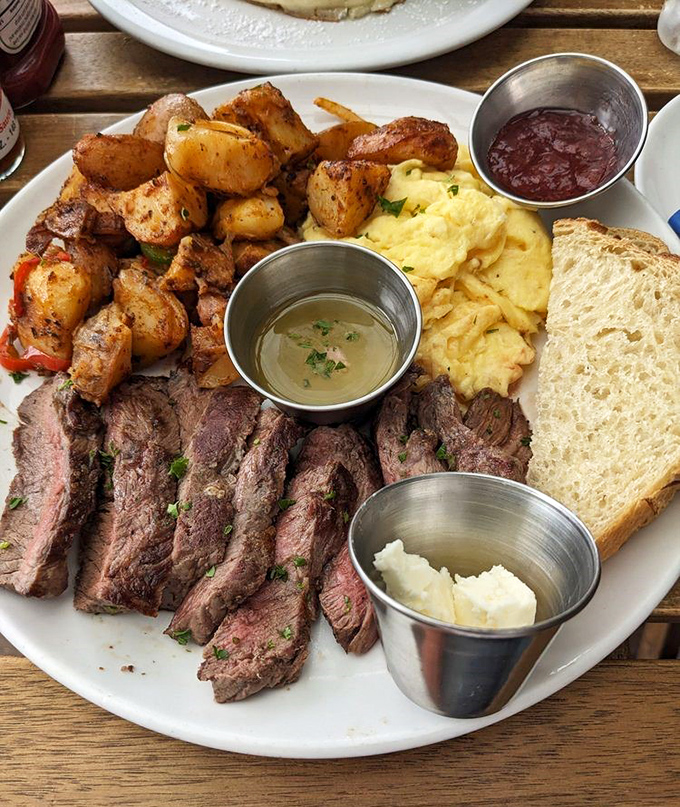 Steak cooked to that magical sweet spot between rare and medium-rare, with eggs and potatoes that make you question why dinner gets all the glory.