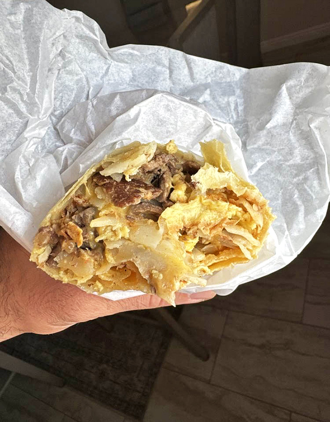 The steak burrito that could probably fuel a small construction crew through their entire morning shift.