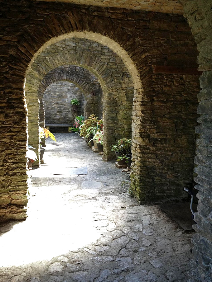 Arched corridors echoing with centuries of craftsmanship and one man's incredible medieval vision.