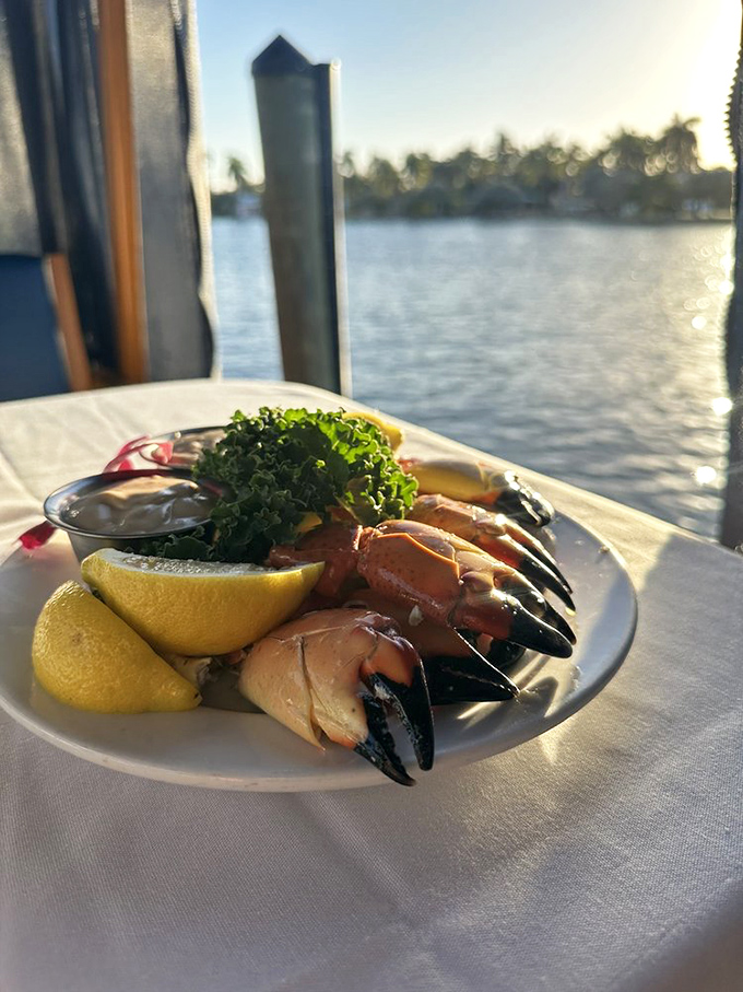 Stone crab claws served with lemon wedges&mdash;nature's perfect design meets culinary simplicity in a dish worth traveling miles for.