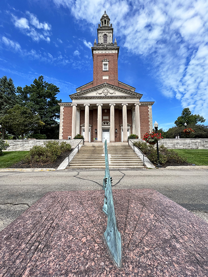 Swasey Chapel rises majestically against azure skies, its brick-and-limestone elegance serving as Denison University's architectural crown jewel.
