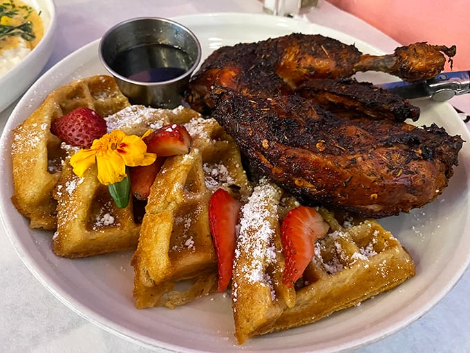 Jerk chicken and sweet potato waffles—a combination so perfect it makes you wonder why we ever settled for plain chicken and regular waffles.