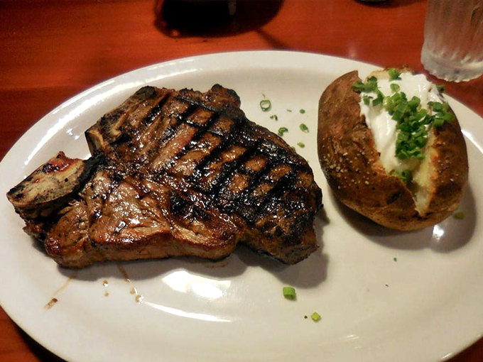 The T-bone: where filet mignon meets New York strip in a beefy romance that's been making carnivores weak in the knees for generations.