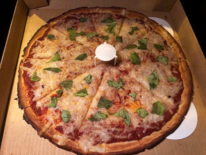 Simple, elegant, and topped with fresh basil – proof that sometimes the classics need no improvement, just quality ingredients and proper execution.