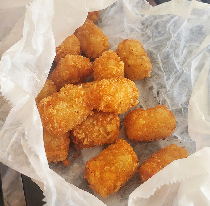 Golden nuggets of potato perfection that make you wonder why anyone bothers with fancy French fries. Comfort food that speaks a universal language.