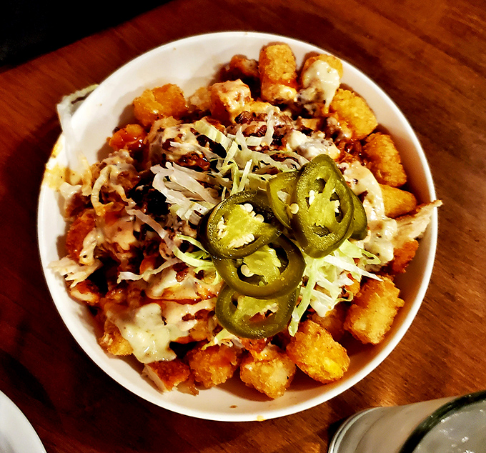 Golden-brown tater tots that crunch like autumn leaves, proving some childhood favorites deserve a permanent spot at the grown-up table.