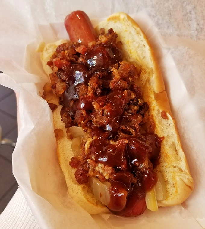 Bacon and BBQ sauce transform an ordinary hot dog into something worth crossing state lines for &ndash; no passport required.
