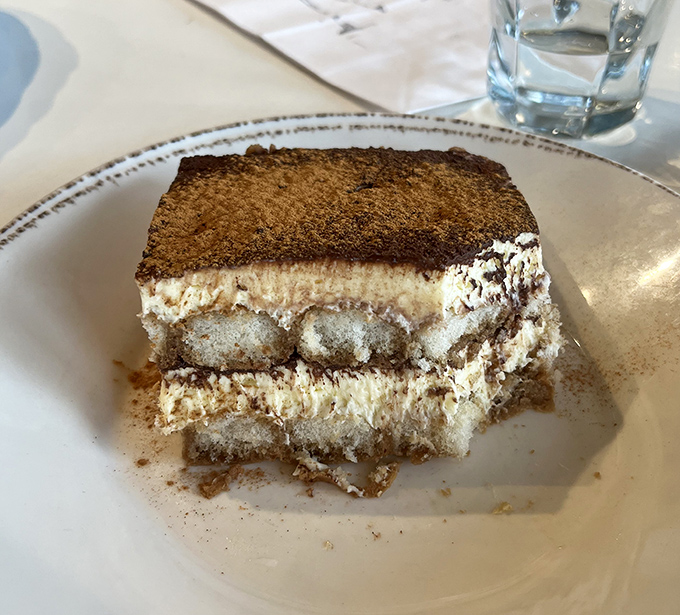 Tiramisu that achieves the impossible trifecta: light as air, rich as Rockefeller, and guaranteed to make you close your eyes in silent appreciation.