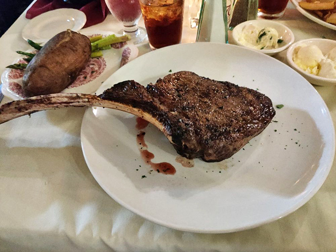 That bone-in ribeye isn't just a steak&mdash;it's prehistoric, primal satisfaction on a plate, with a handle nature thoughtfully provided. 