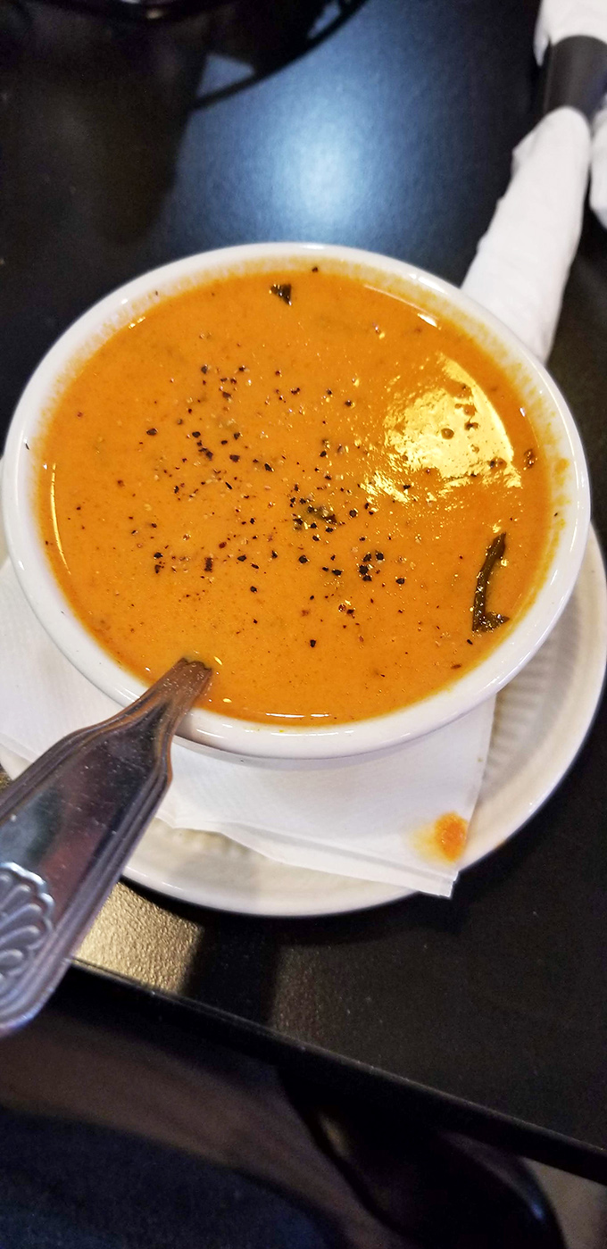 This tomato soup isn't messing around. Rich, velvety, and sporting those telltale flecks of black pepper that say "homemade with attitude."