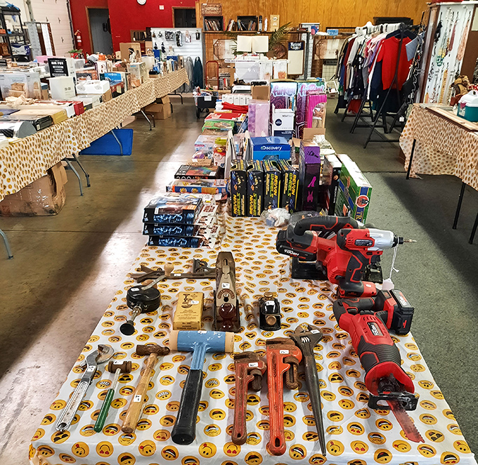 Tool paradise for the DIY enthusiast! From vintage pipe wrenches to modern power drills, this table has everything to fix what ails your home. 