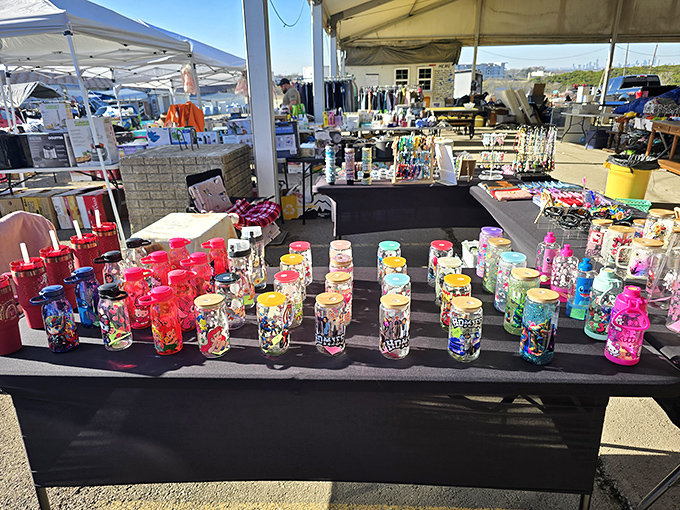 Rainbow-colored tumblers stand like soldiers on parade, each one promising to keep your sweet tea cold during those scorching Texas afternoons.