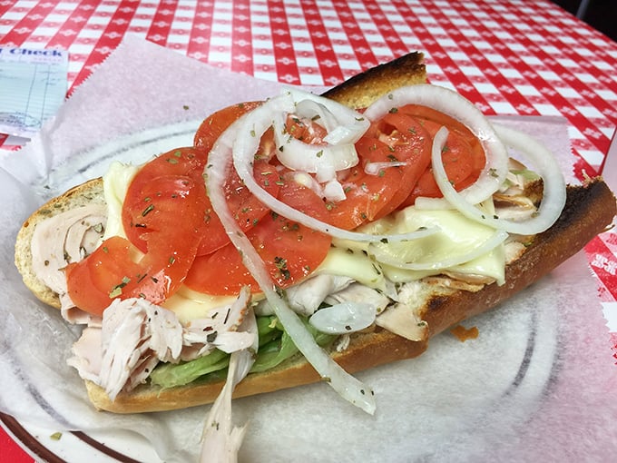 Fresh ingredients stacked with architectural precision &ndash; this turkey and Swiss creation isn't just a sandwich, it's edible engineering at its finest.