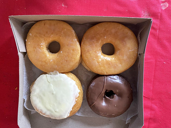 The classic quartet: Two glazed rings of perfection flanked by chocolate-dipped decadence and a lemon-filled cloud of sunshine.