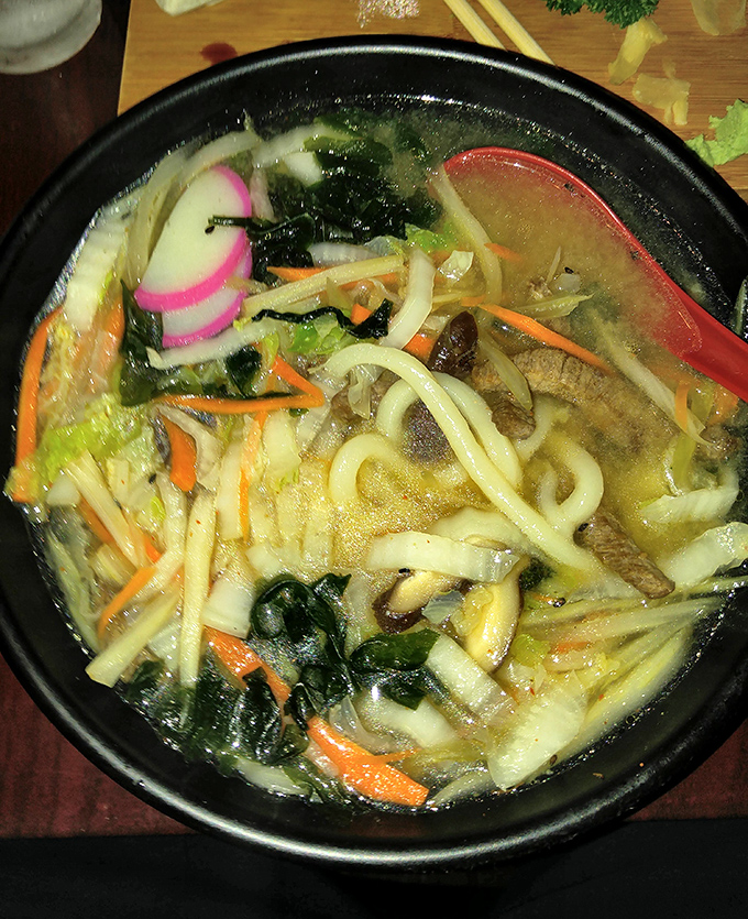 Soul-warming udon that puts chicken soup to shame. Those delicate pink kamaboko slices floating among the noodles are like little life rafts of flavor.