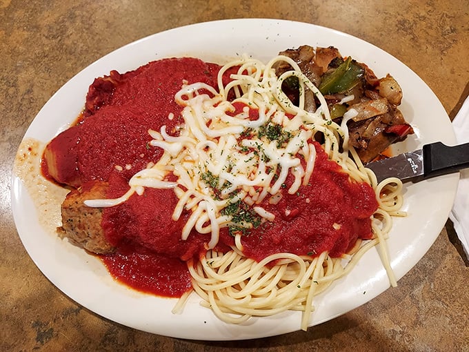 Spaghetti and red sauce done the way your Italian grandmother would approve—if your grandmother believed in portion sizes that could feed a small village.