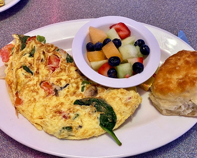 A veggie omelet so colorful it could double as a Monet painting you can eat.