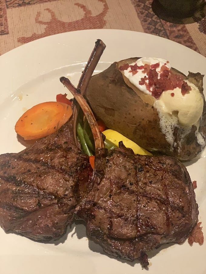 Venison chops that would make any hunter jealous. The loaded baked potato alongside is comfort food's perfect companion to wilderness cuisine.